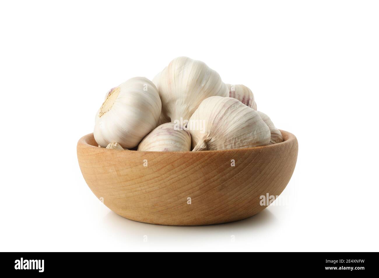 Wooden bowl with garlic isolated on white background Stock Photo - Alamy