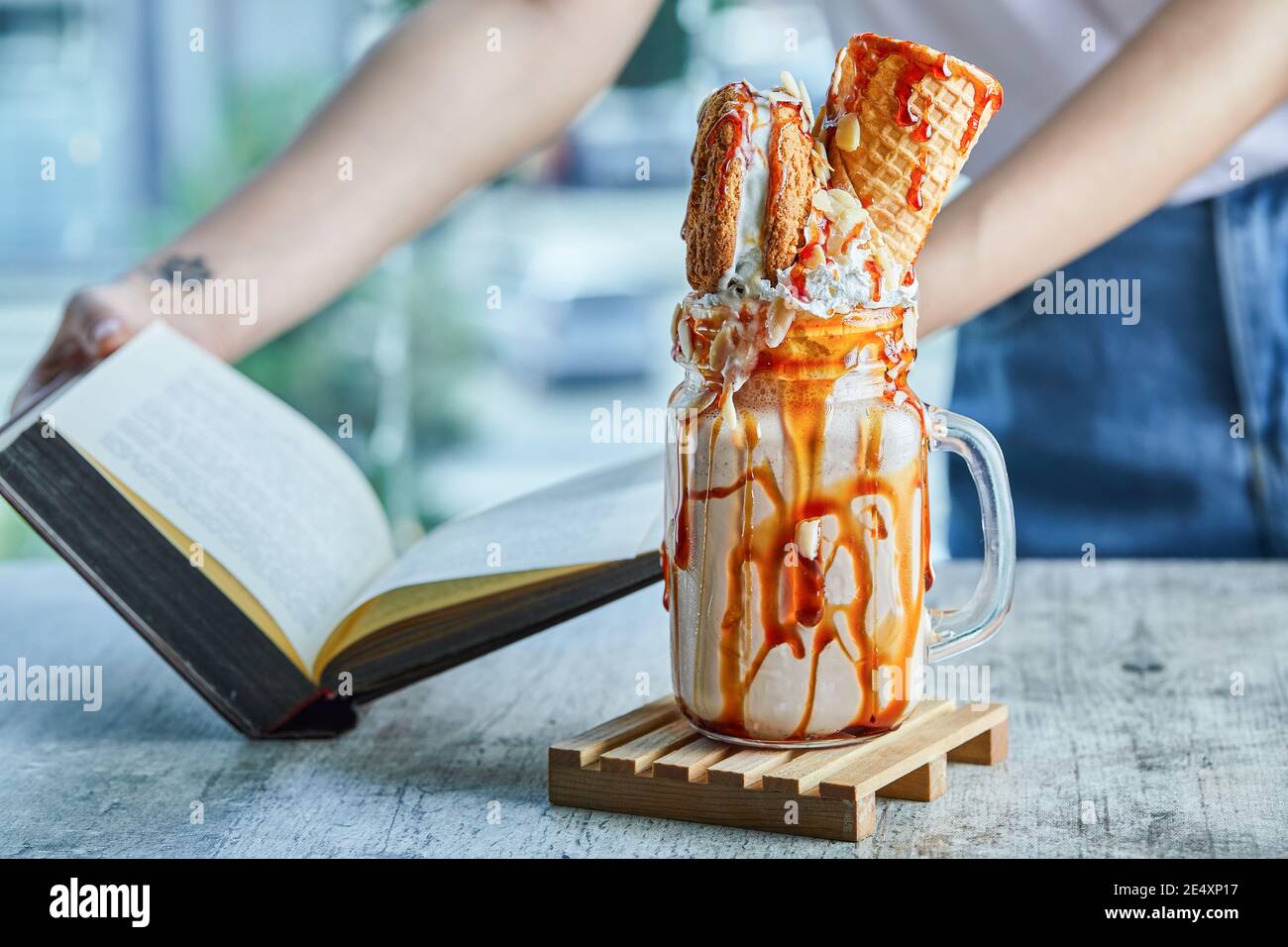 Holding milkshake hi-res stock photography and images - Alamy