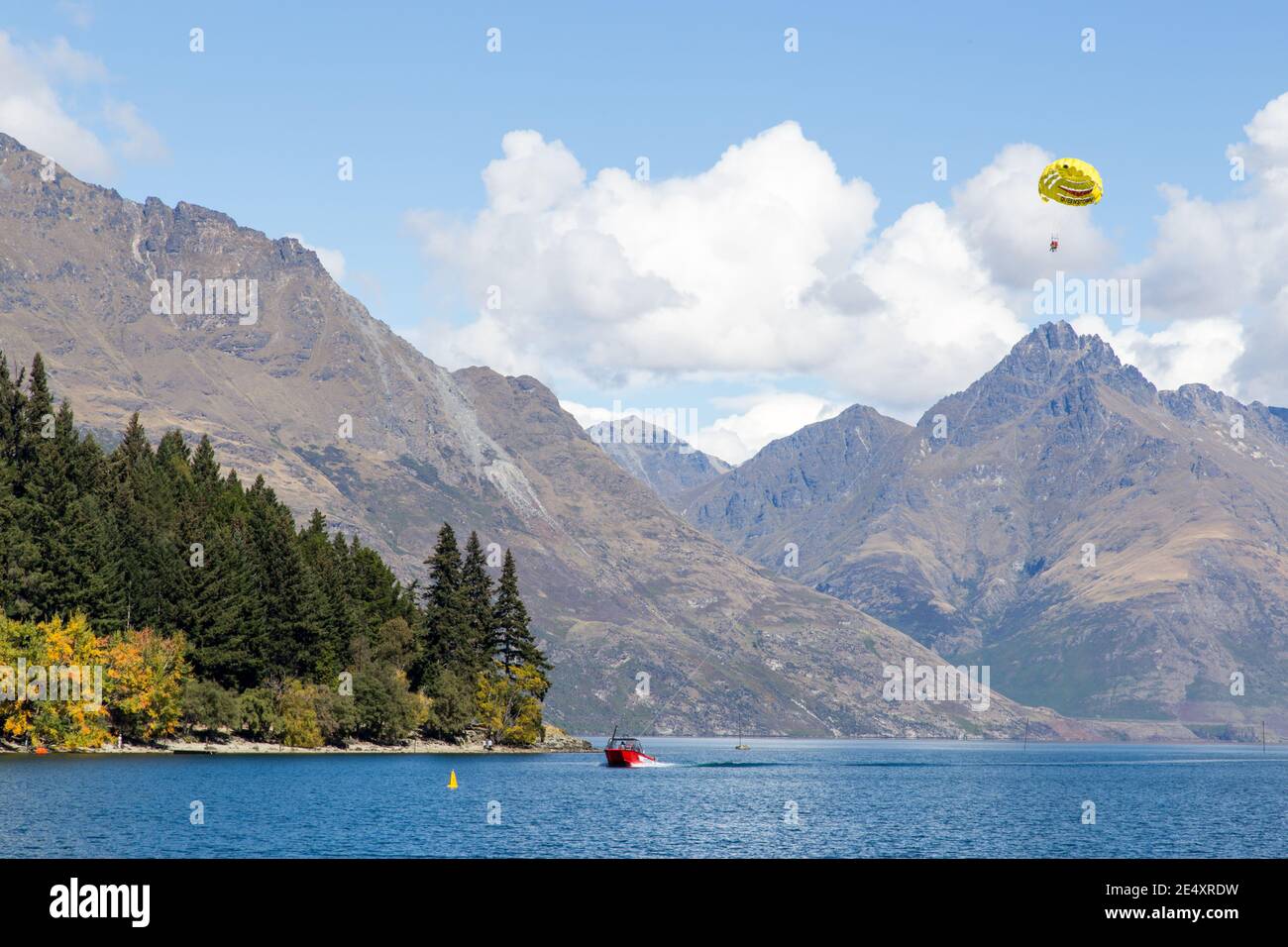 Parasailing in Queenstown Bay, New Zealand Stock Photo - Alamy