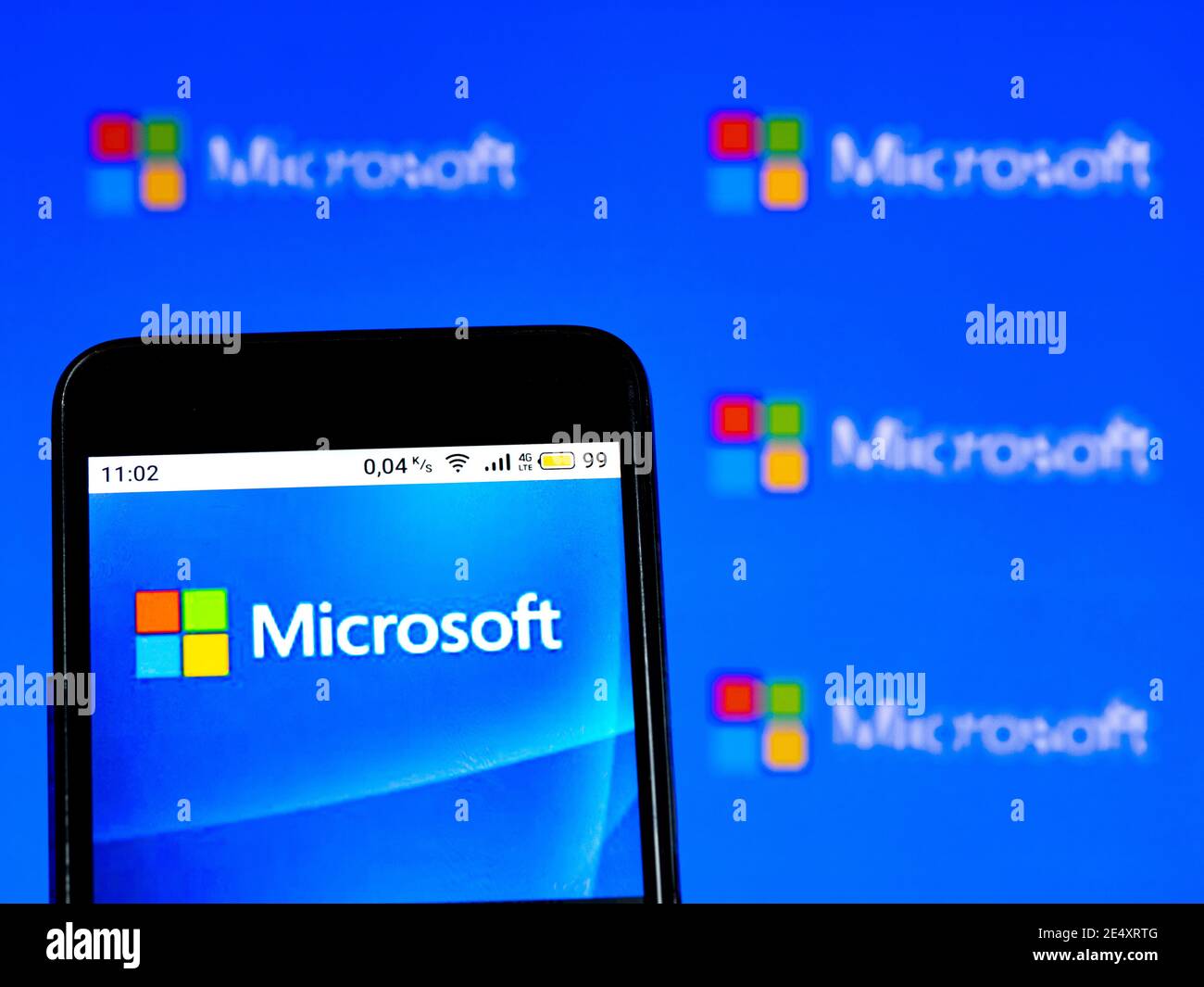 In this photo illustration a Microsoft logo seen displayed on ...