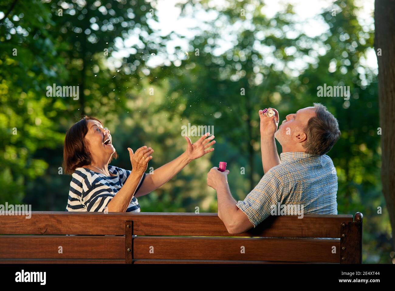 Couples Blowing Bubbles