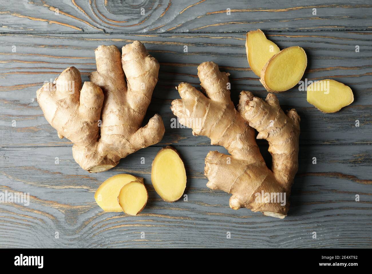 Fresh ginger on wooden hi-res stock photography and images - Alamy