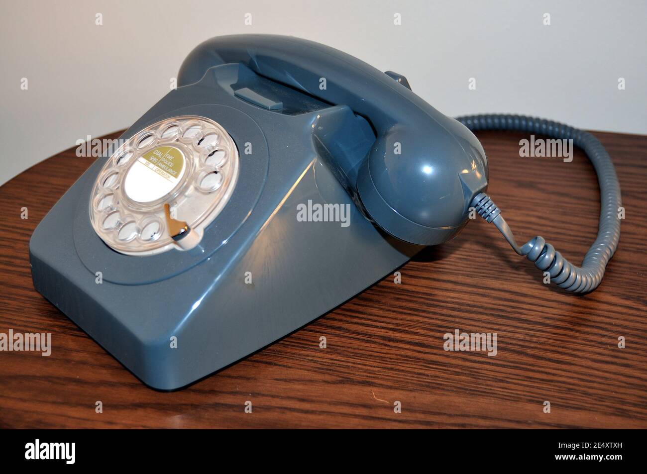 Retro UK 1970s Telephone on Wooden Desk Stock Photo - Alamy
