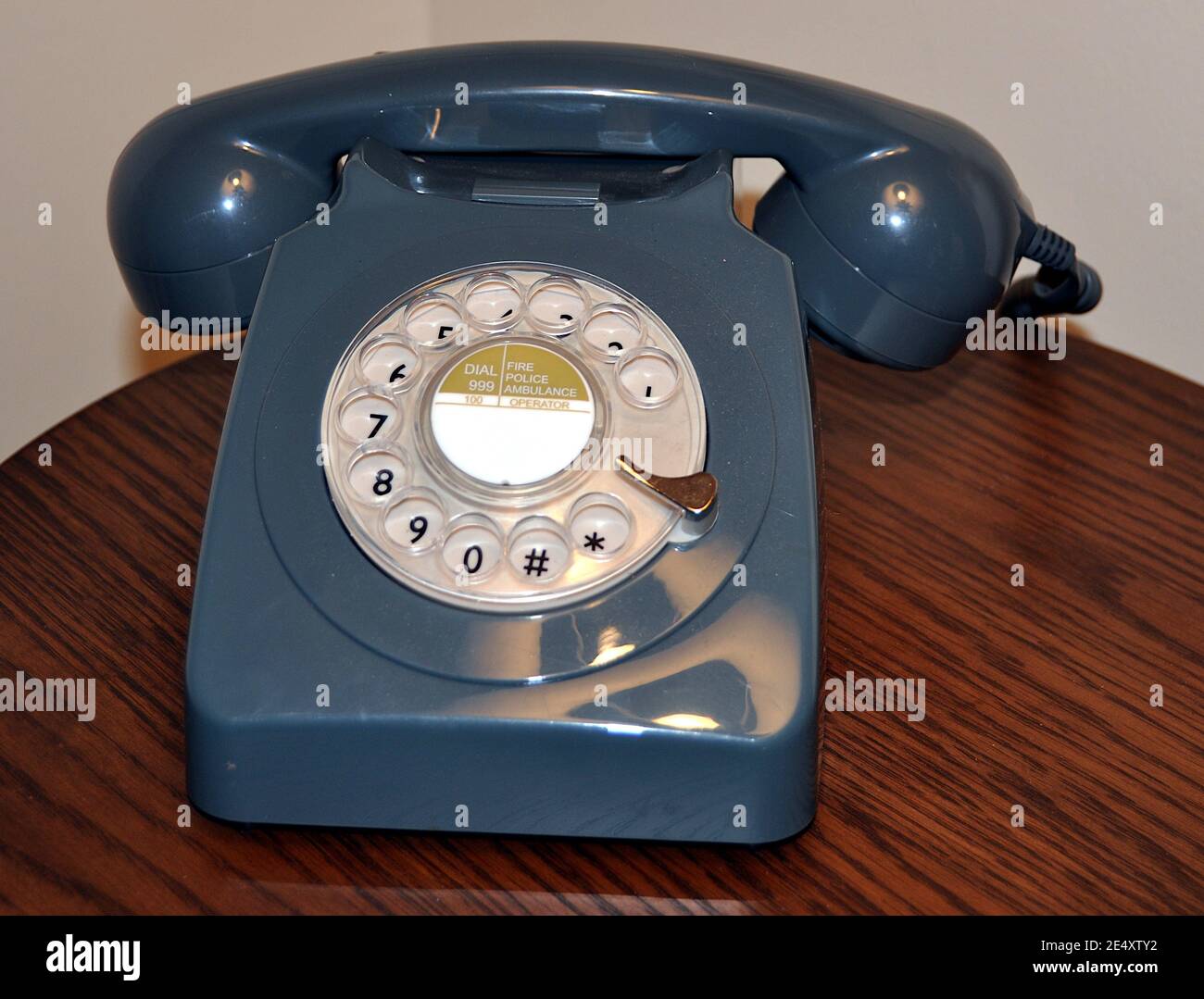 Retro UK 1970s Telephone on Wooden Desk Stock Photo - Alamy