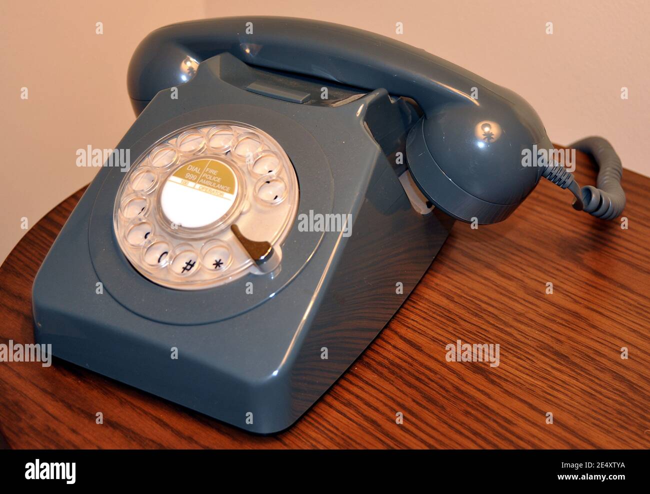 Retro UK 1970s Telephone on Wooden Desk Stock Photo - Alamy