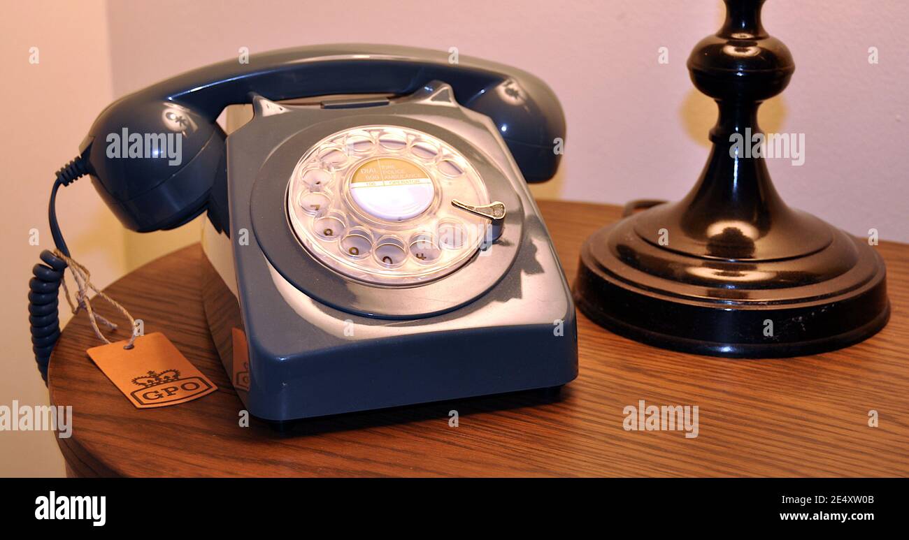 Retro UK 1970s Telephone on Wooden Desk Stock Photo - Alamy