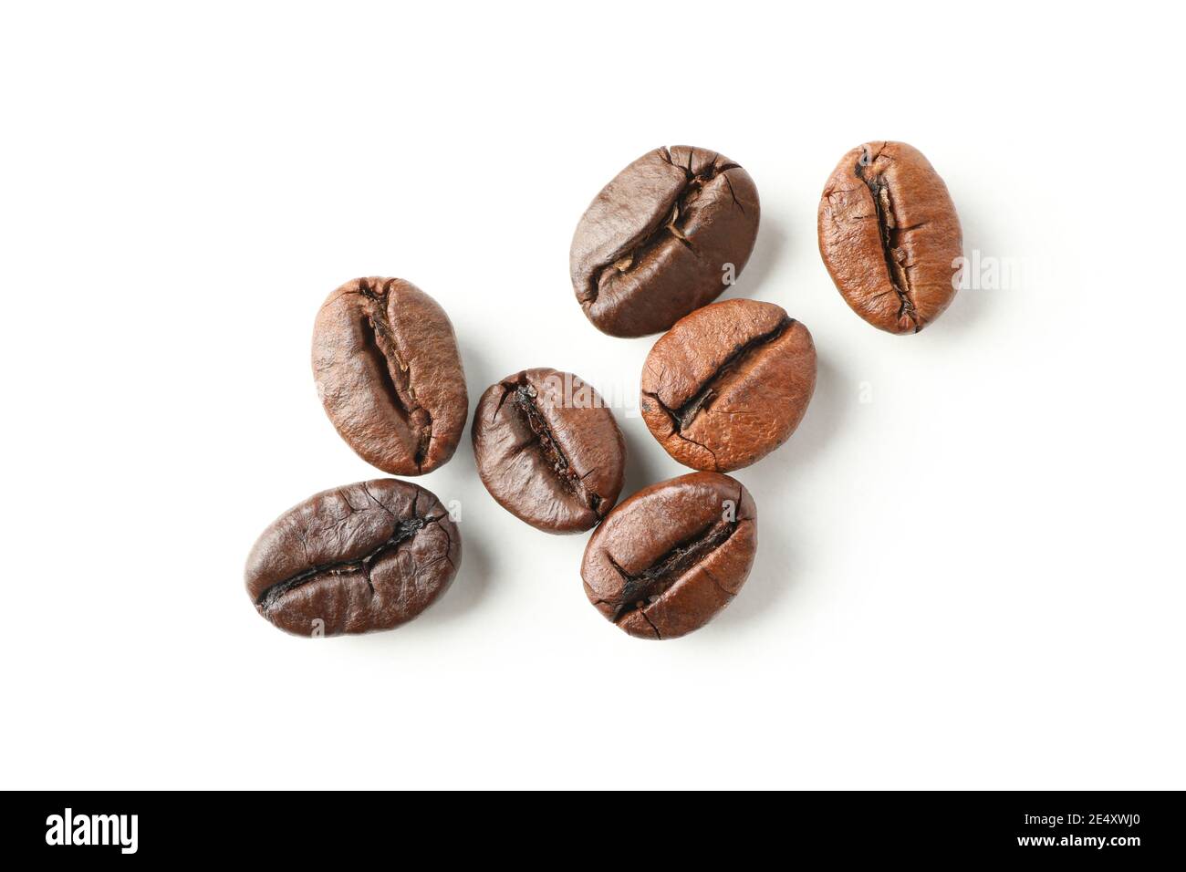 Fresh coffee seeds isolated on white background Stock Photo - Alamy