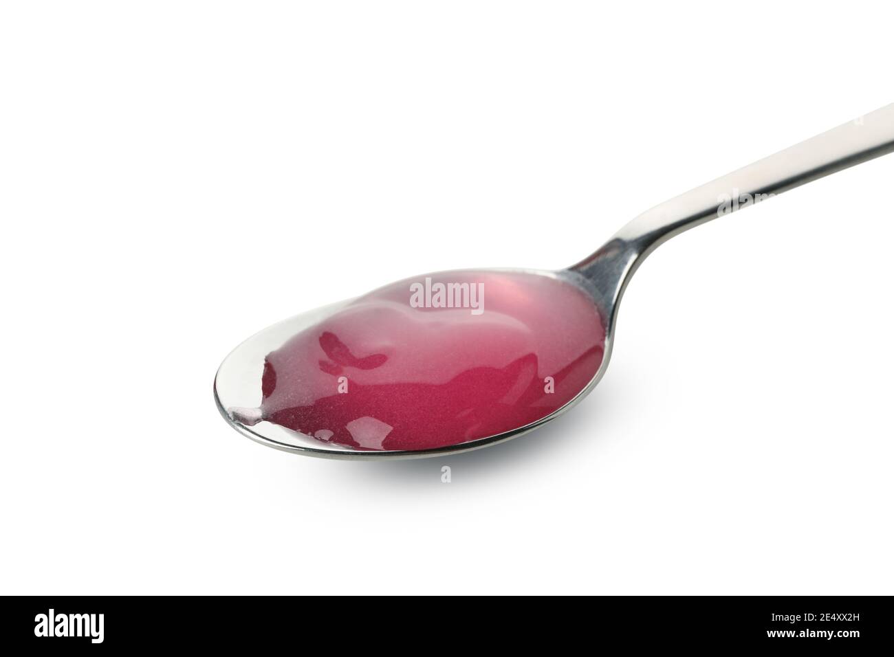 Spoon with syrup isolated on white background Stock Photo - Alamy