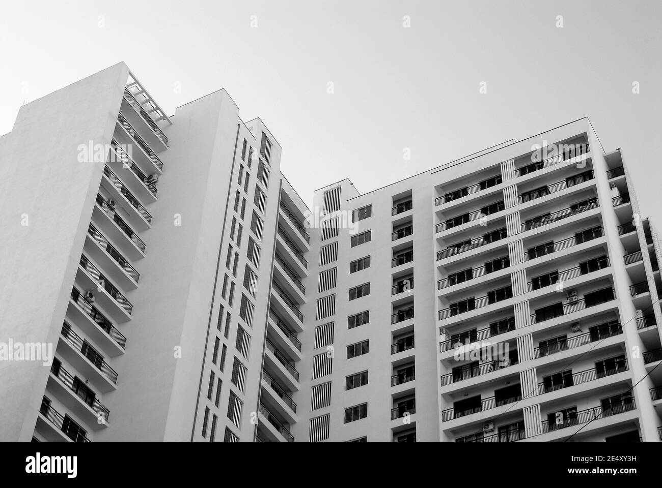 Modern multistory building view from the ground Stock Photo - Alamy