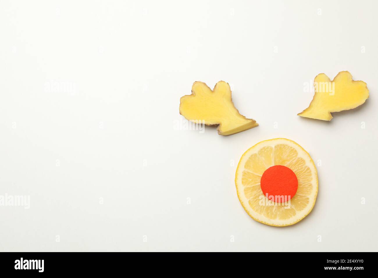Deer antlers made of ginger and lemon on white background Stock Photo ...