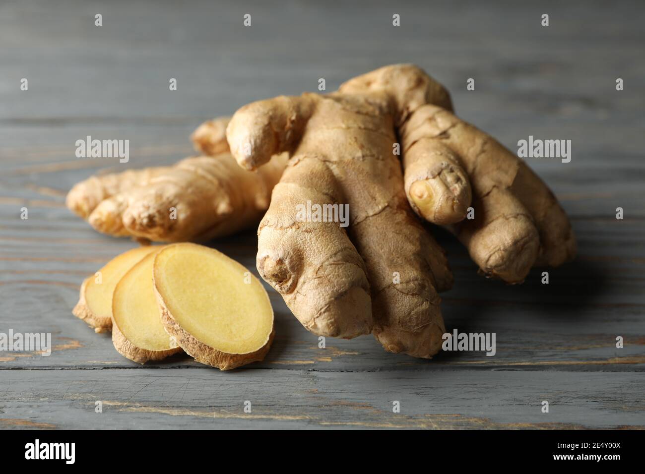 Fresh ginger on wooden hi-res stock photography and images - Alamy