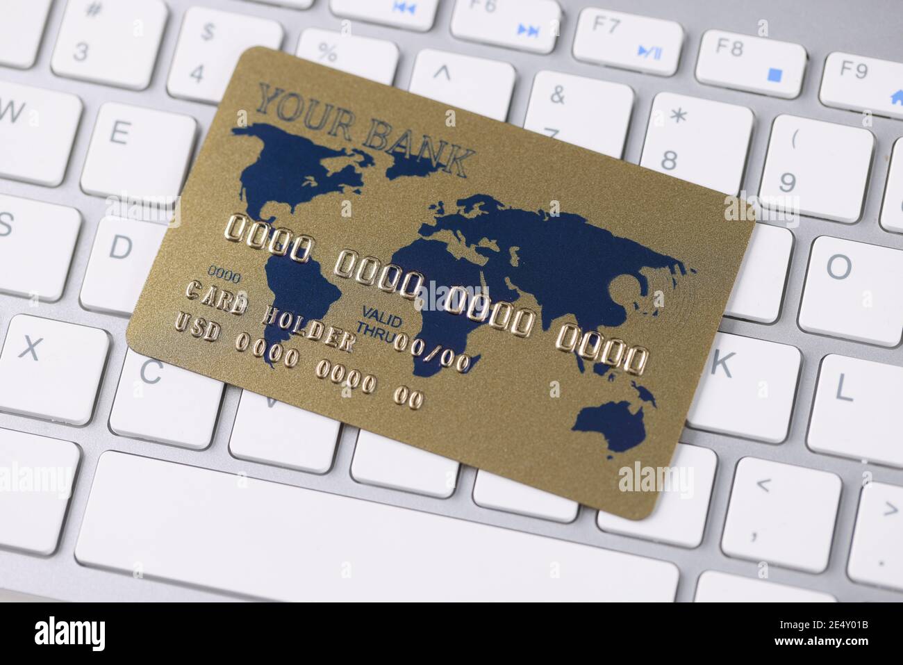 Plastic credit bank card is on keyboard Stock Photo - Alamy