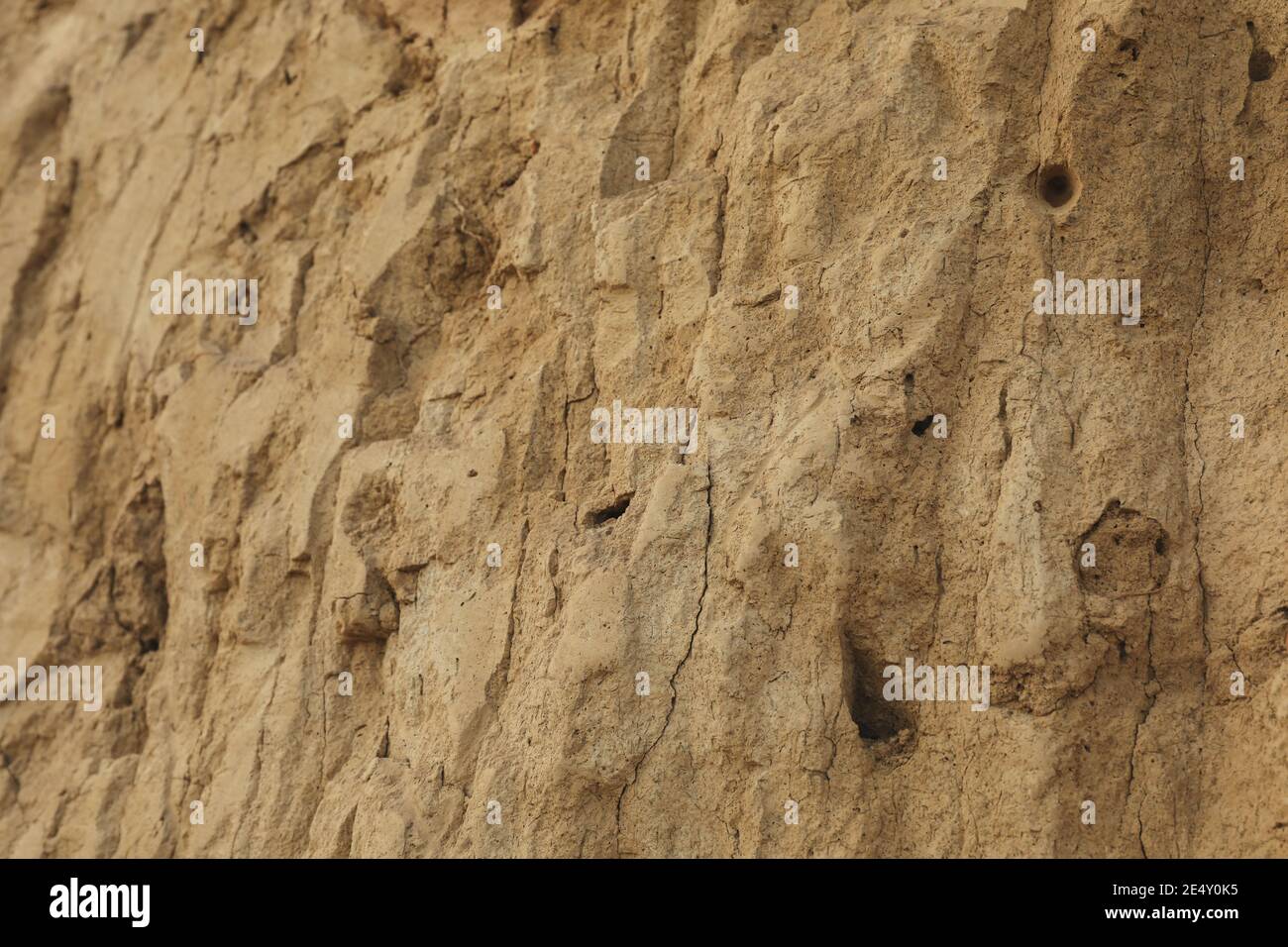 Clay soil of slope on whole background Stock Photo - Alamy