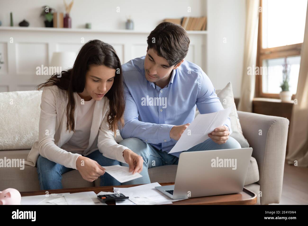 Serious man checking documents hi-res stock photography and images - Alamy