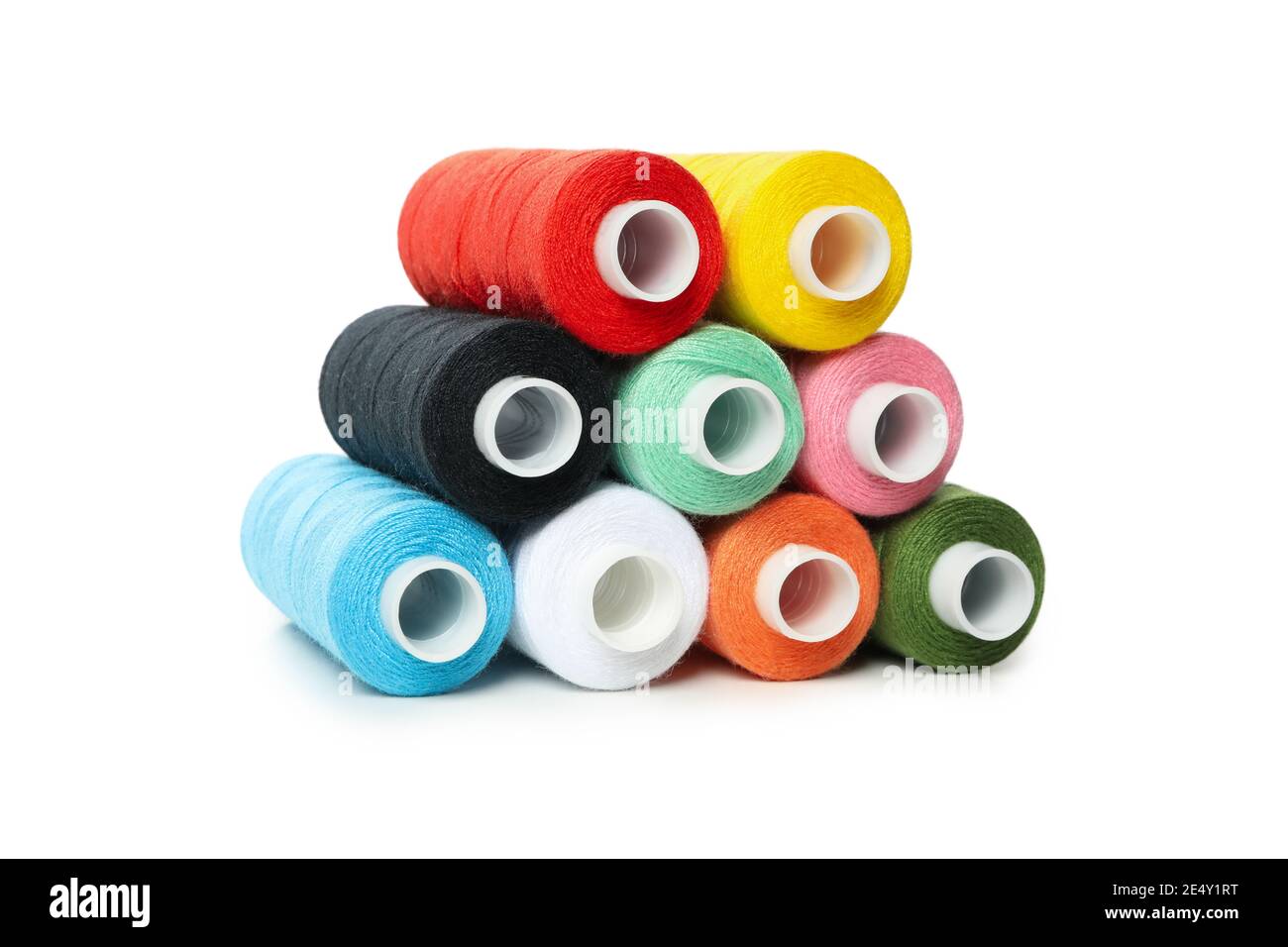 Color thread spools isolated on white background Stock Photo - Alamy