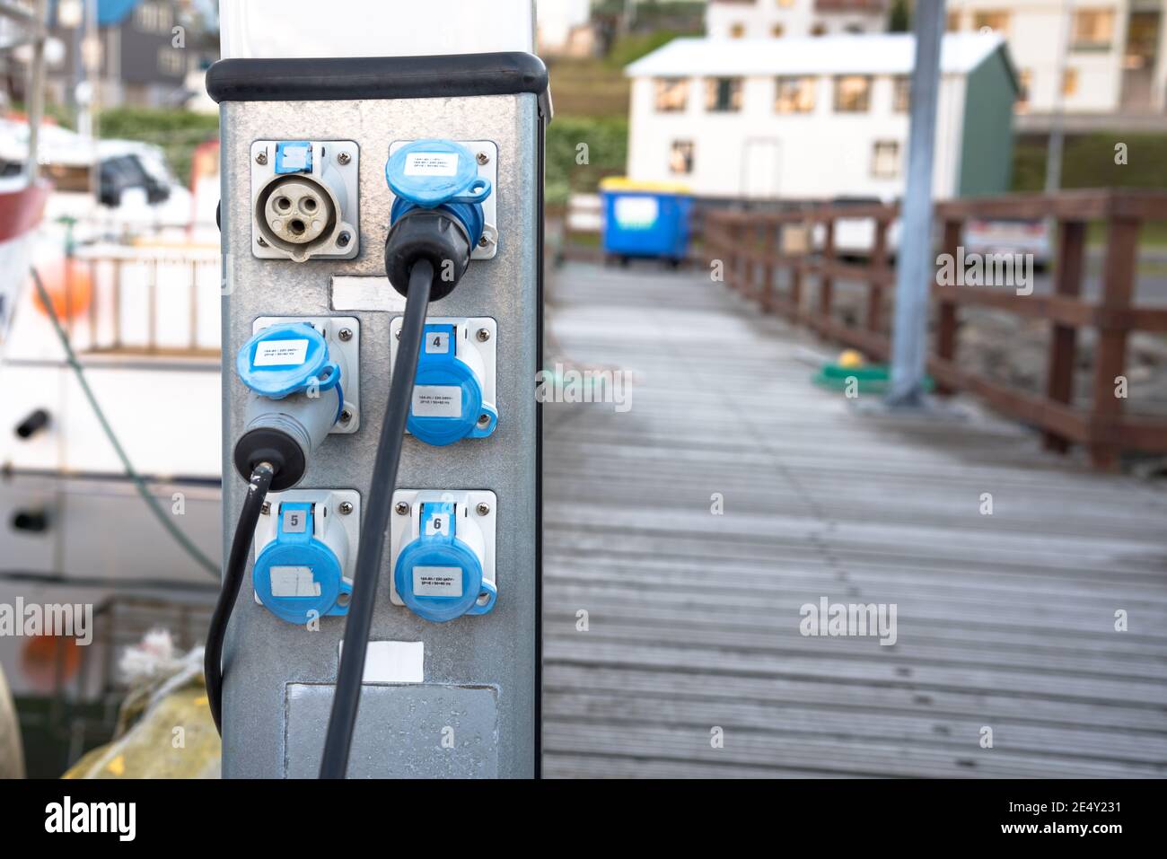 Close up of an electric socket point on a pier in a harbor Stock Photo ...