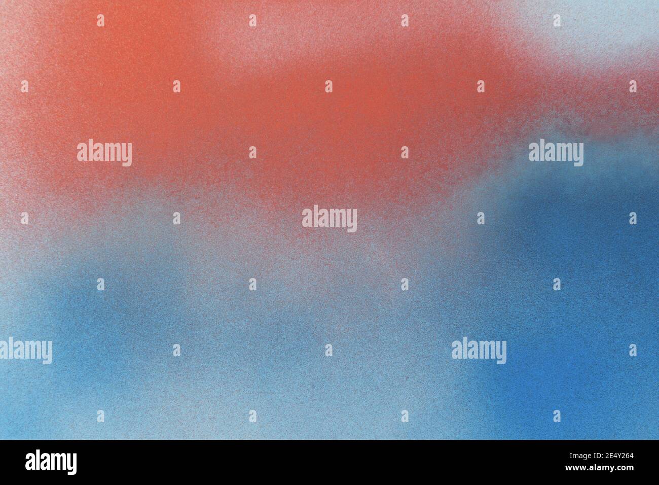 red and blue spray paint on blue background Stock Photo - Alamy