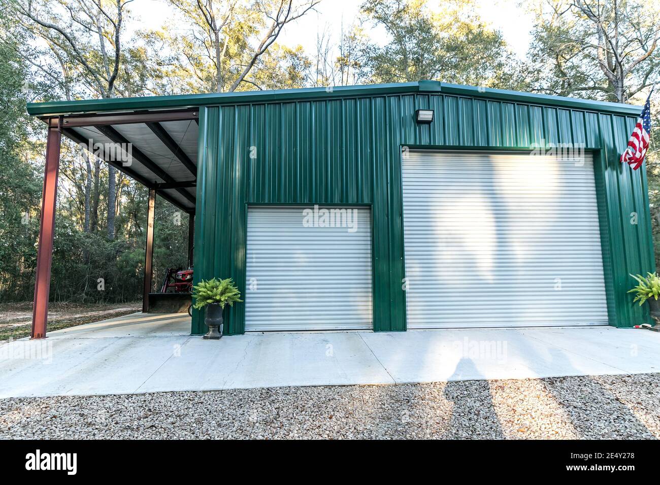 Large green outdoor metal building Stock Photo - Alamy