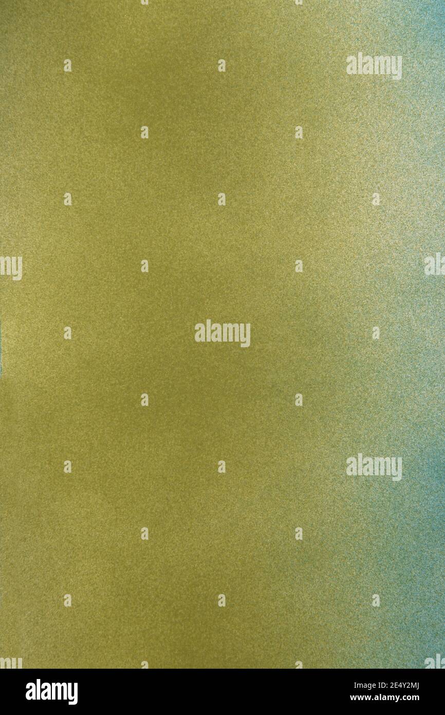 spray paint gradient from green to blue on a white paper background ...