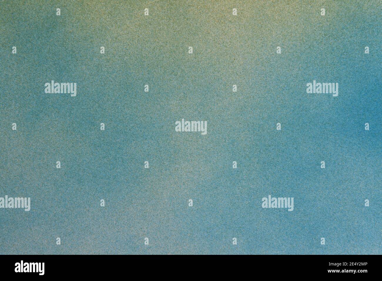 spray paint gradient from green to blue on a white paper background ...