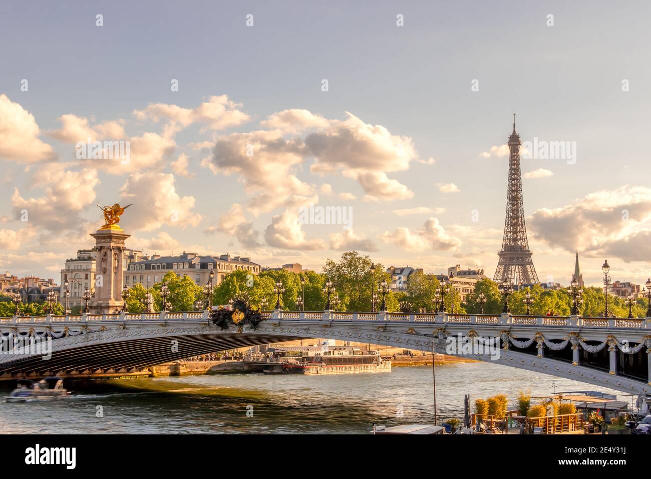 France. Sunny summer day in Paris. Alexander III Bridge and Eiffel ...
