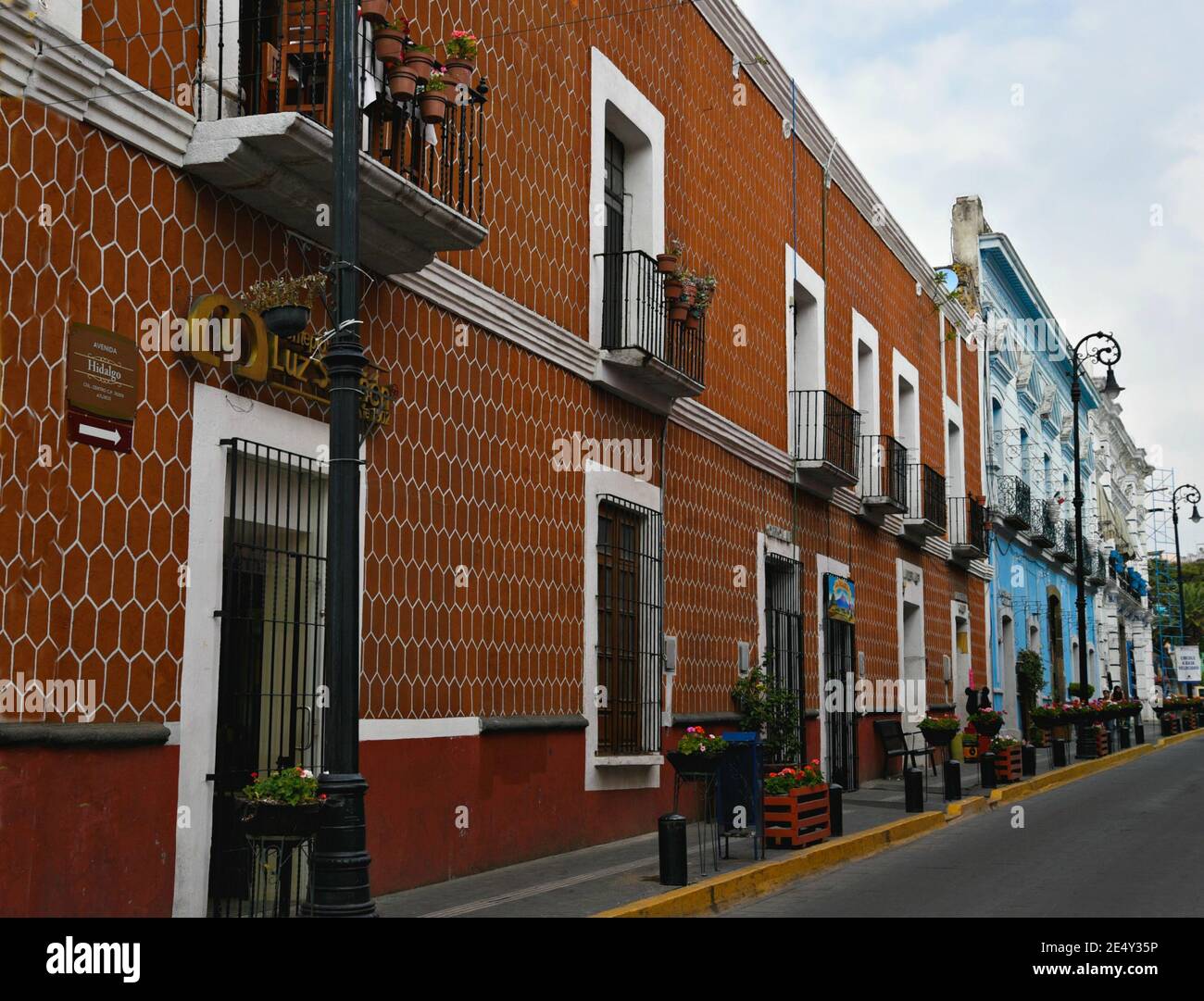 Exterior view of Colonial style buildings with brick and Talavera tile ...