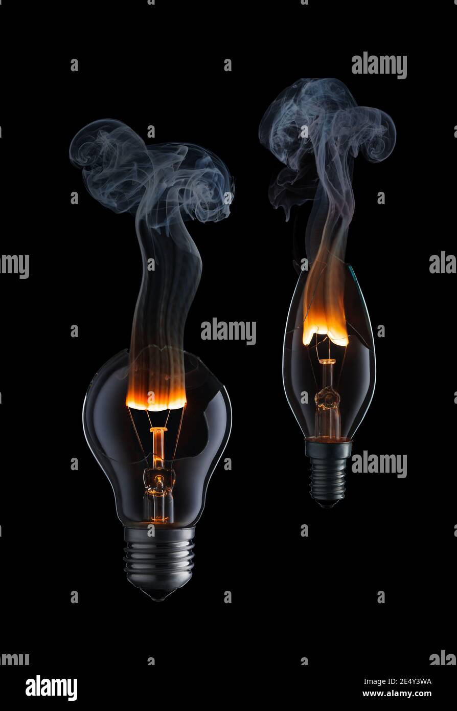 Collection of light bulbs with fire and smoke on black background Stock ...