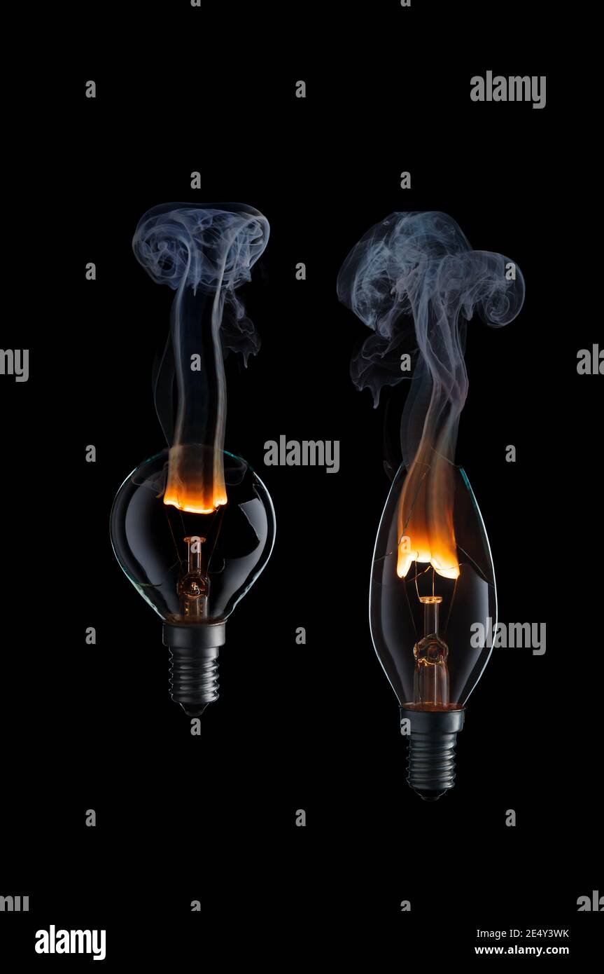 Collection of light bulbs with fire and smoke on black background Stock ...