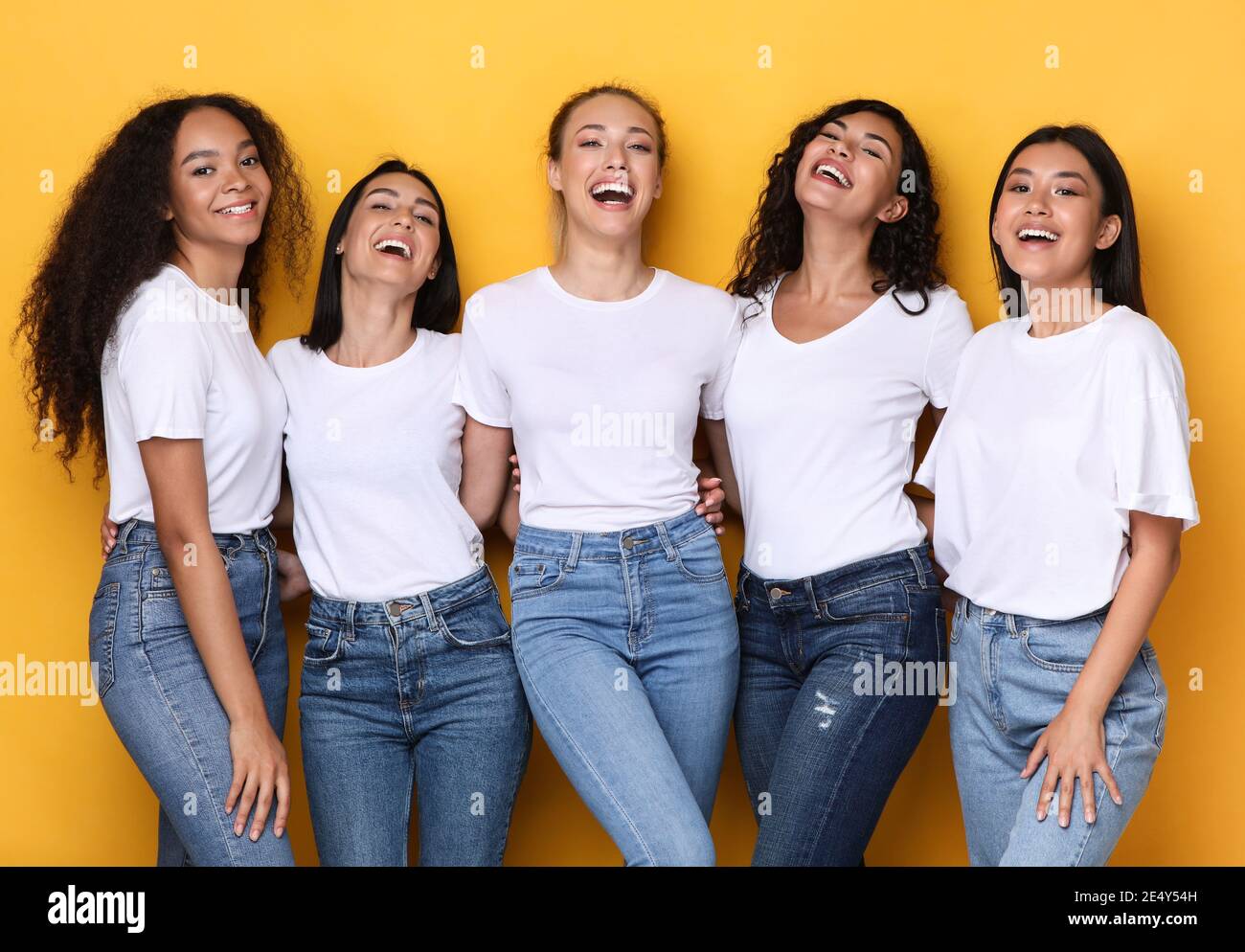 Five Cheerful Females Millennials Laughing Standing Over Yellow ...