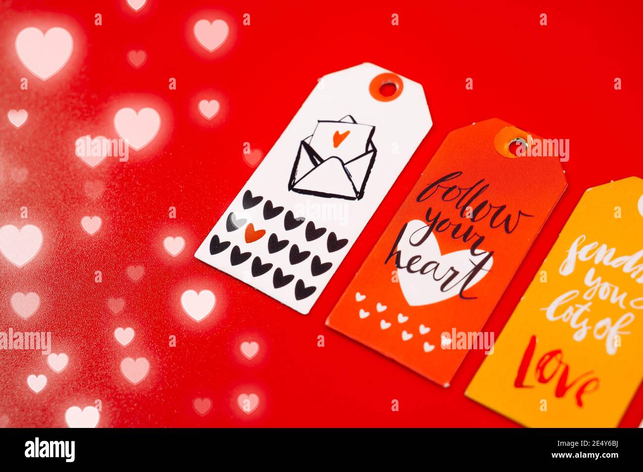 Valentine's day tags isolated on red background. Valentine'd background ...