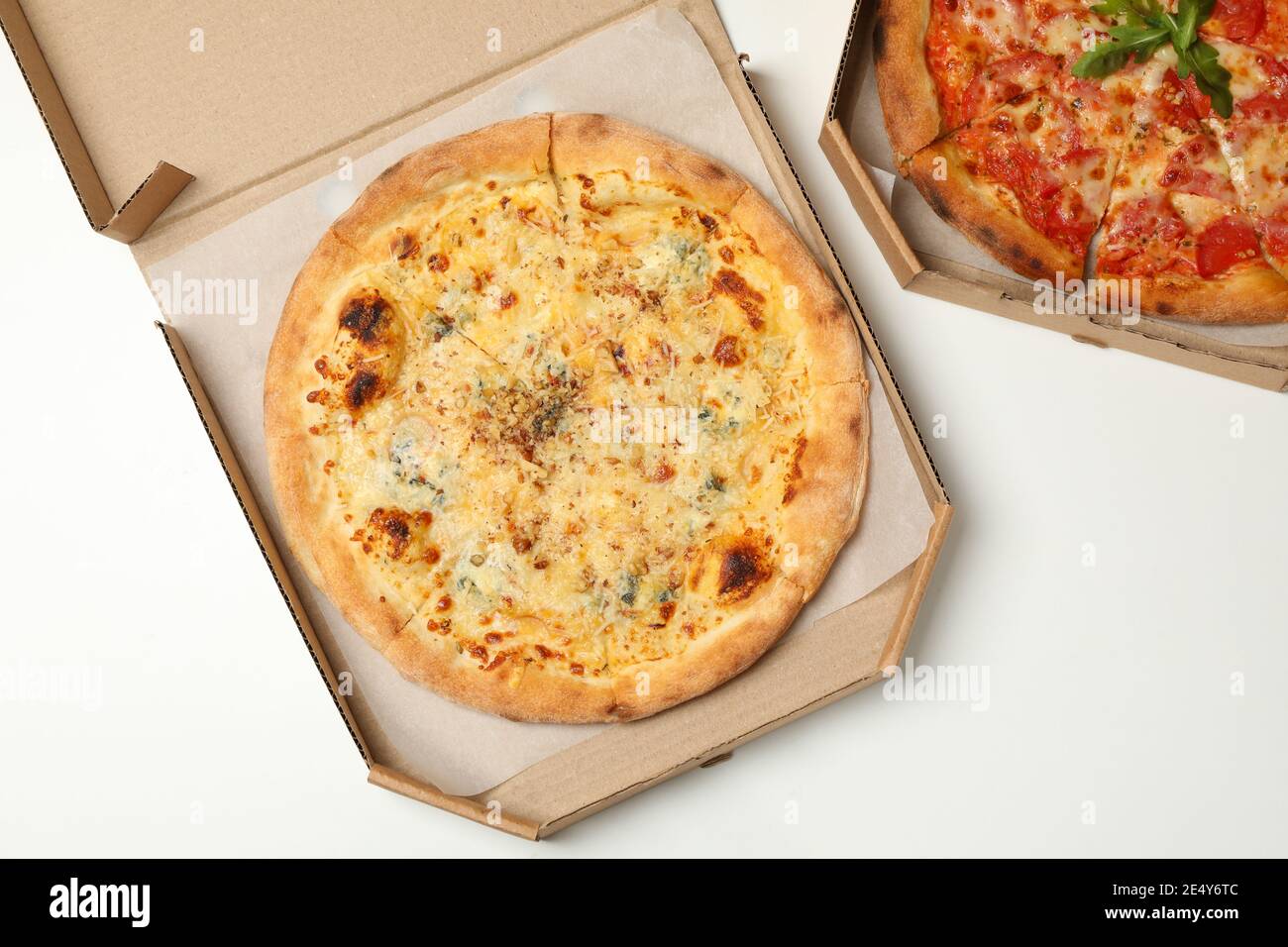 Two pizza in carton boxes on white background Stock Photo - Alamy