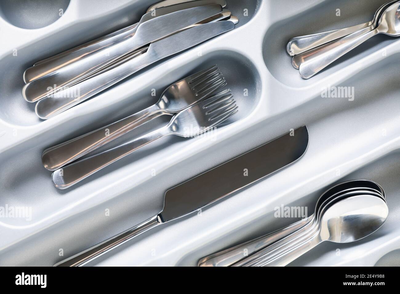 Set of different cutlery on whole background, close up Stock Photo - Alamy