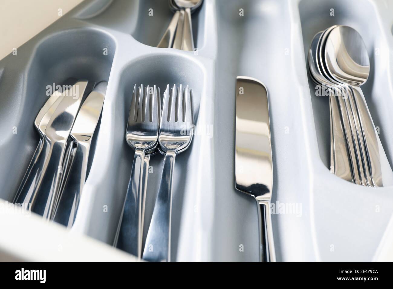 Set of different cutlery on whole background, close up Stock Photo - Alamy