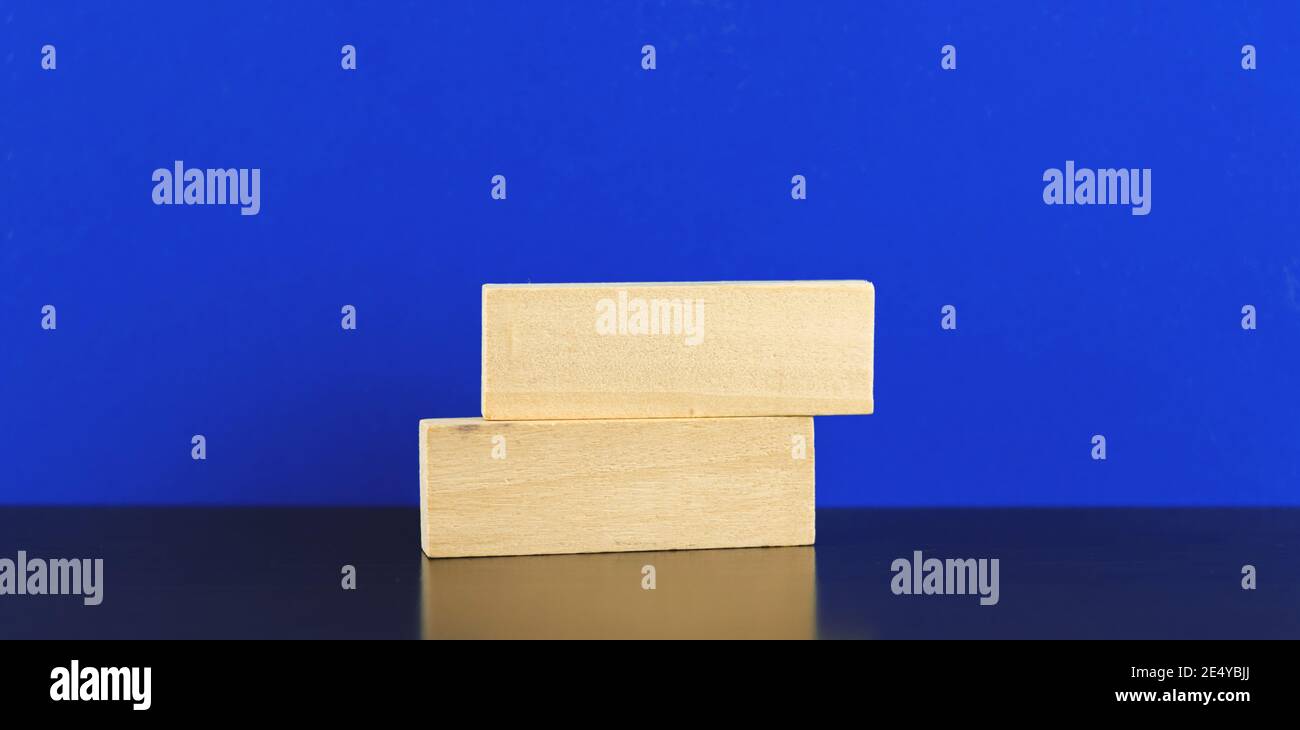 Business template, mockup, wooden pegs, blocks on a table, blue ...