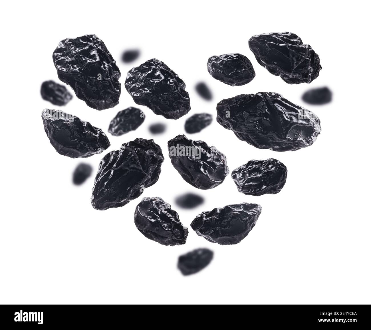 Dried plums in the shape of a heart on a white background Stock Photo ...