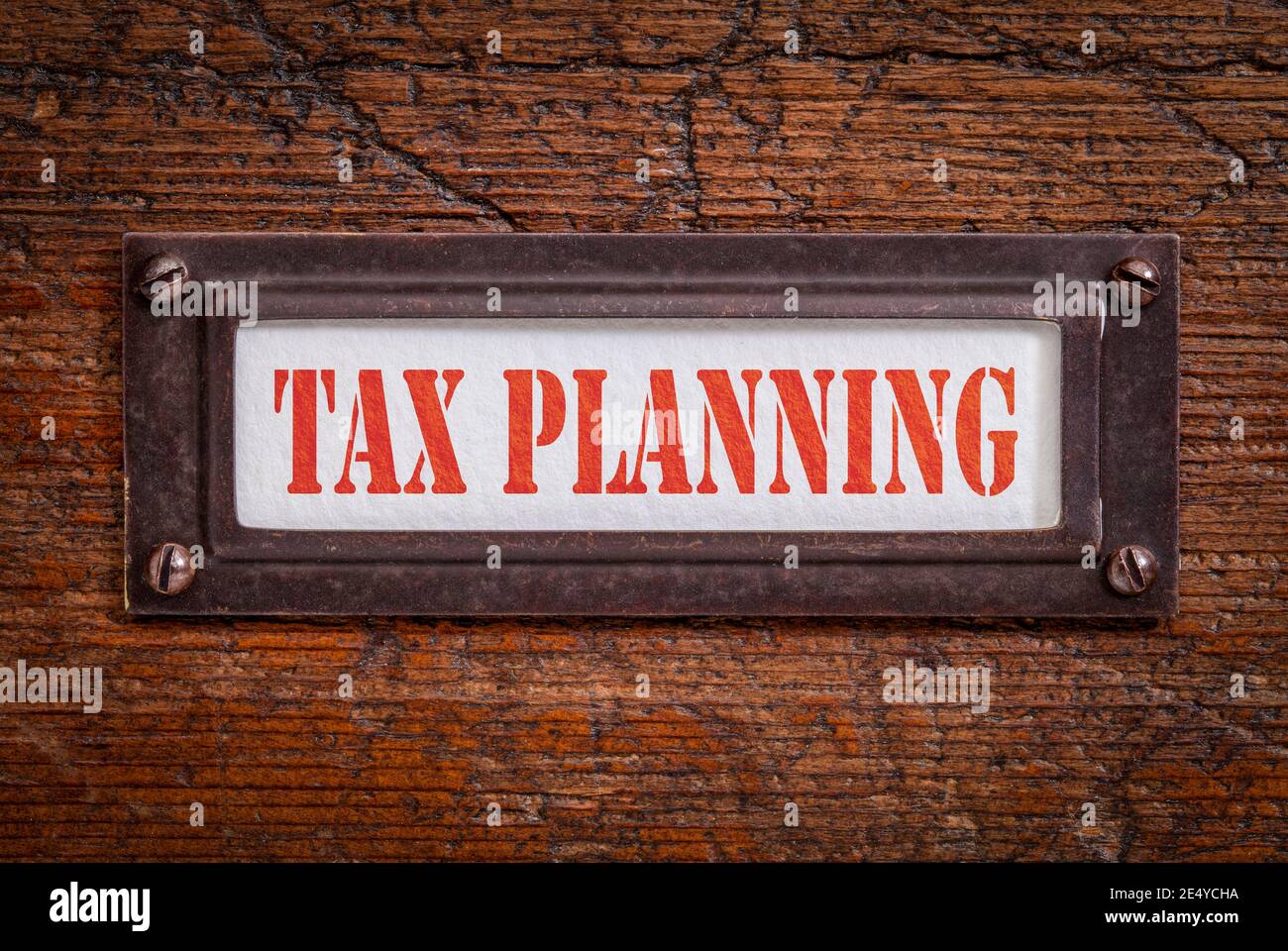 tax planning - a label on grunge wooden file cabinet. Business and ...
