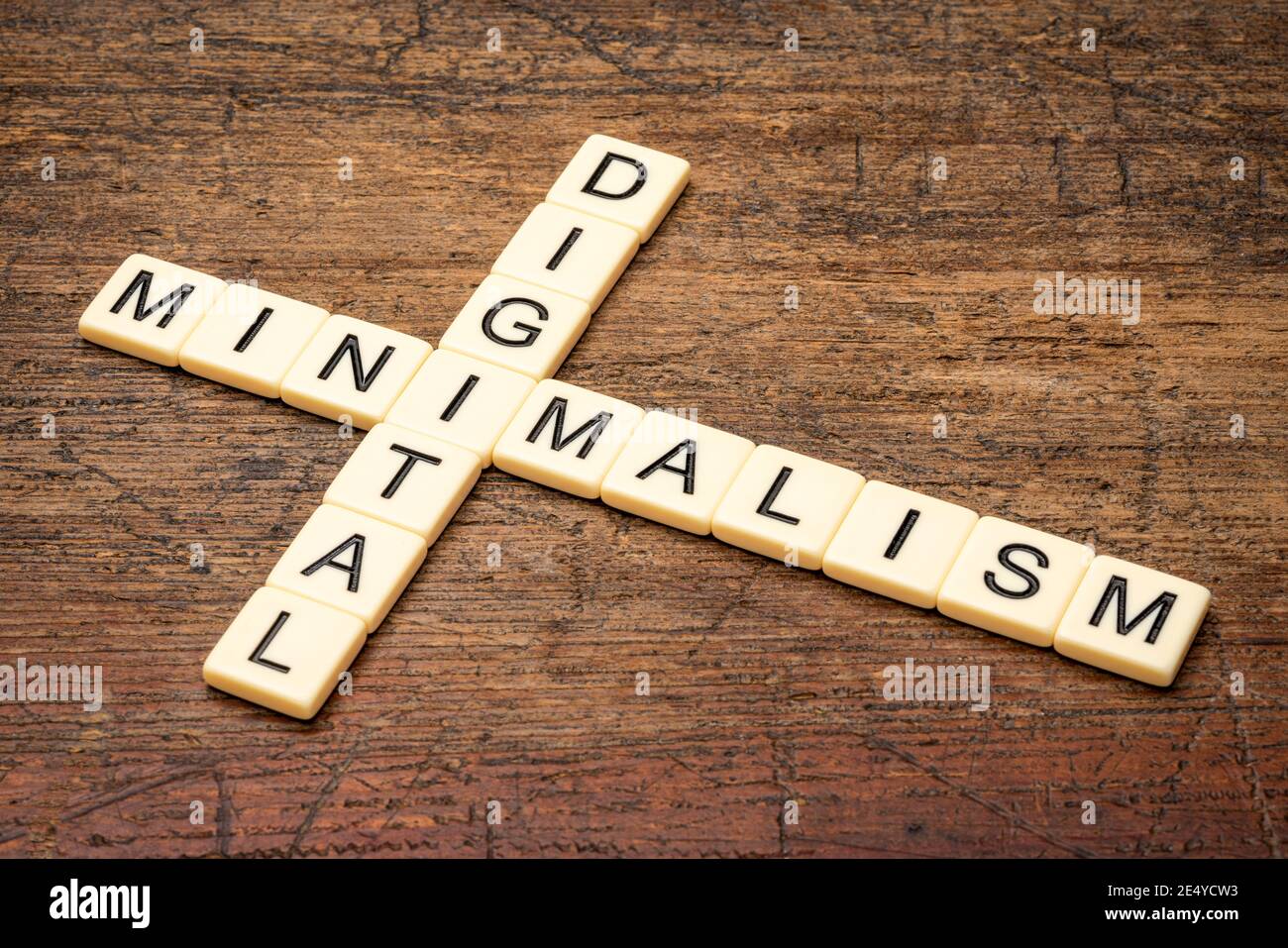 digital minimalism crossword in ivory letter tiles against textured ...