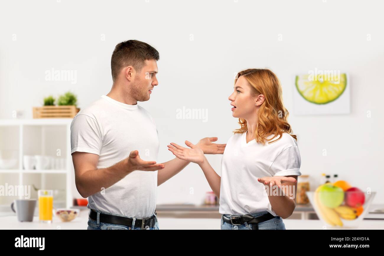 unhappy couple having argument at kitchen Stock Photo - Alamy