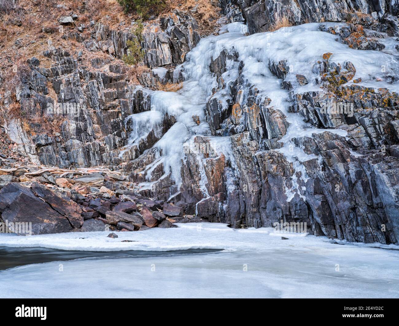 icy cliff on a canyon of mountain river in winter scenery - Poudre ...