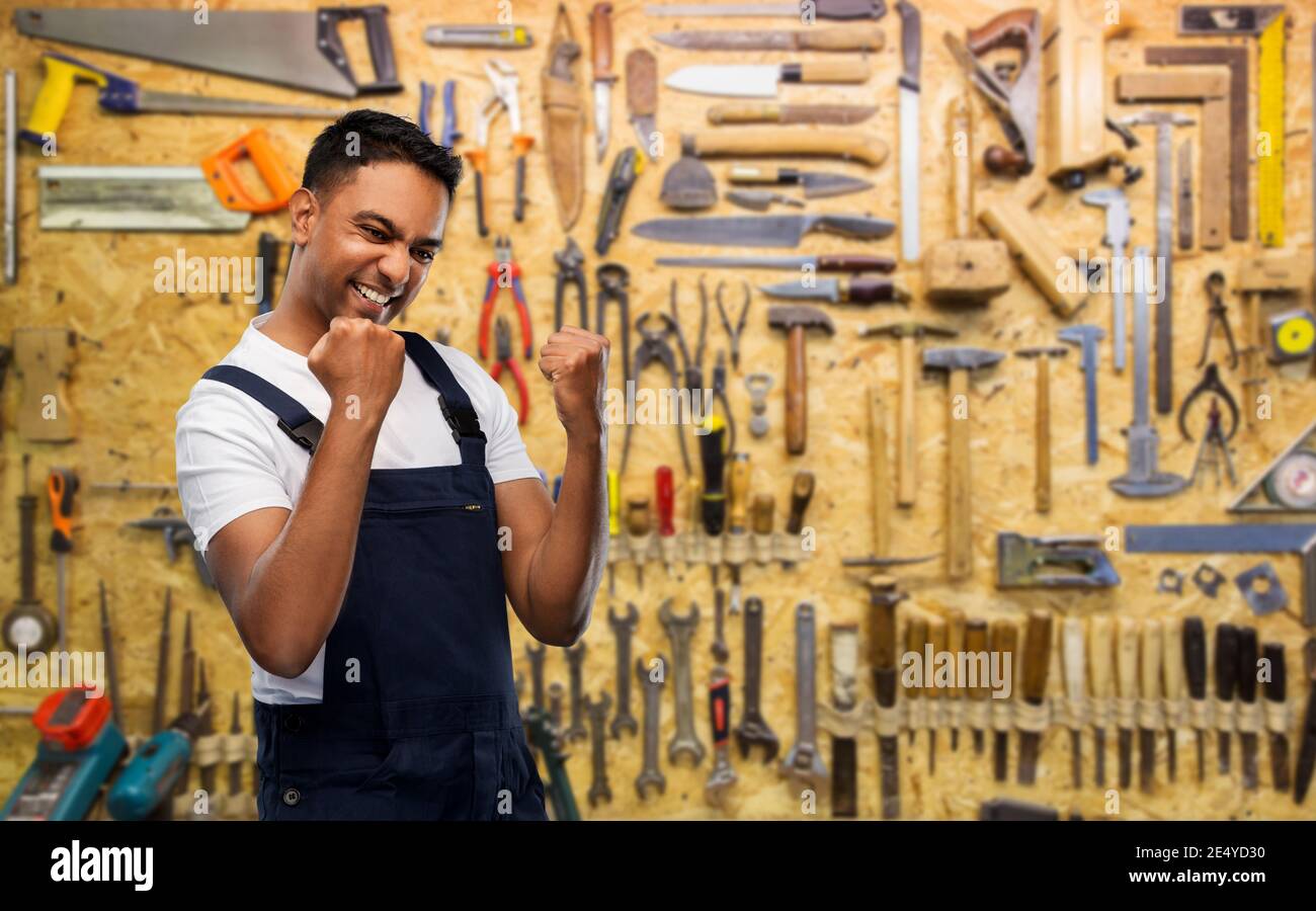 happy indian worker or builder celebrating success Stock Photo - Alamy