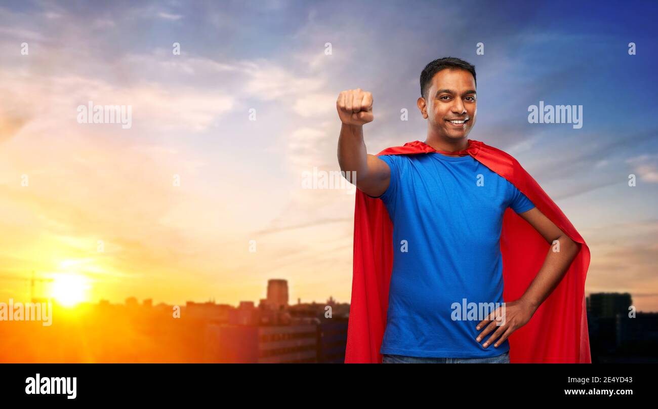 indian man in superhero cape makes winning gesture Stock Photo - Alamy