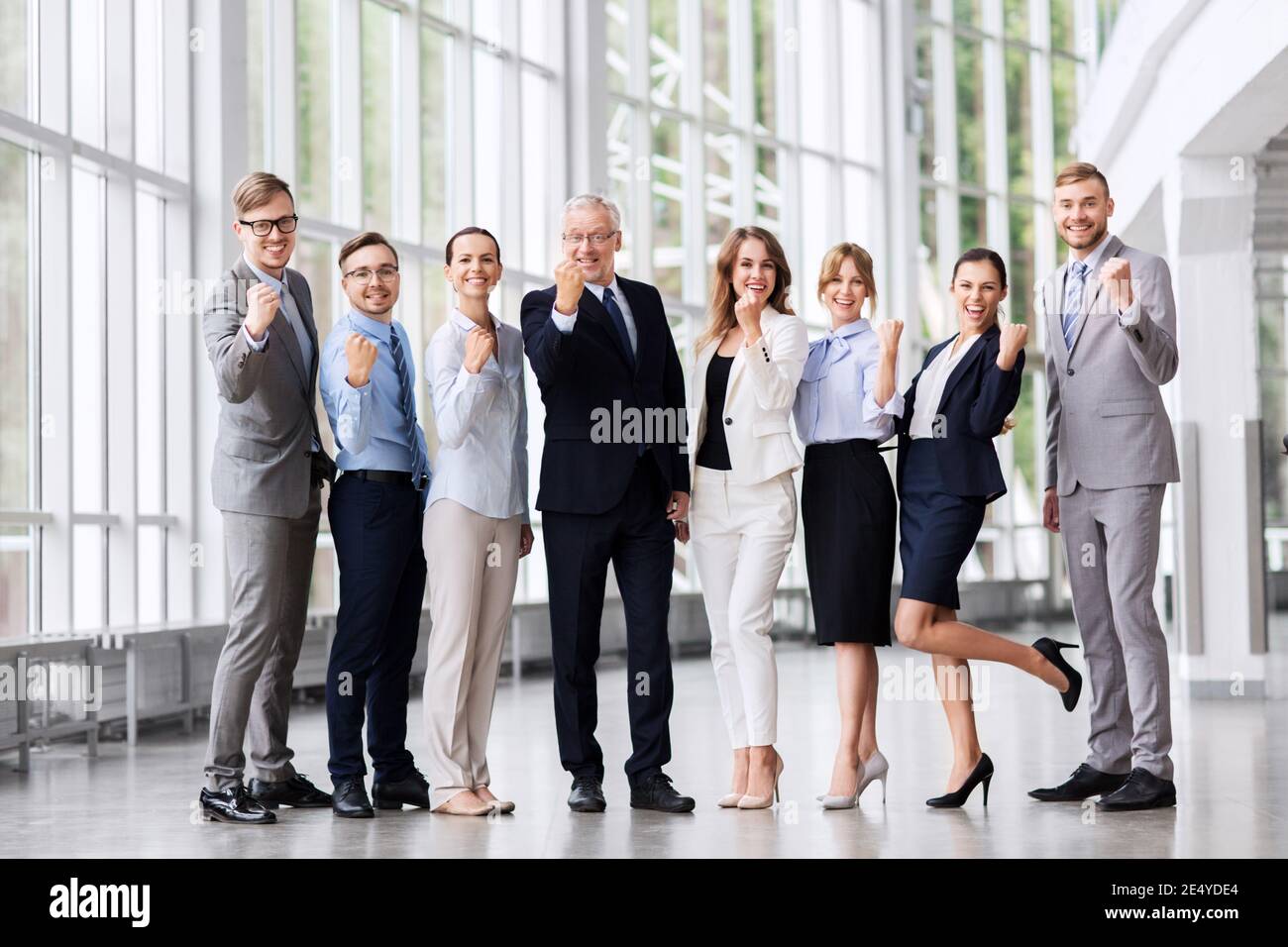 happy business team celebrating success at office Stock Photo - Alamy