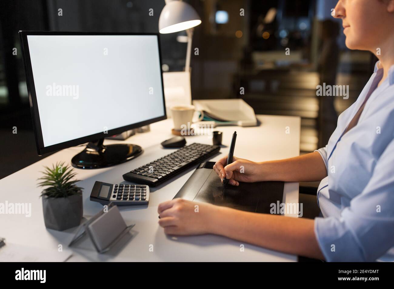 designer with computer and pen tablet at office Stock Photo - Alamy