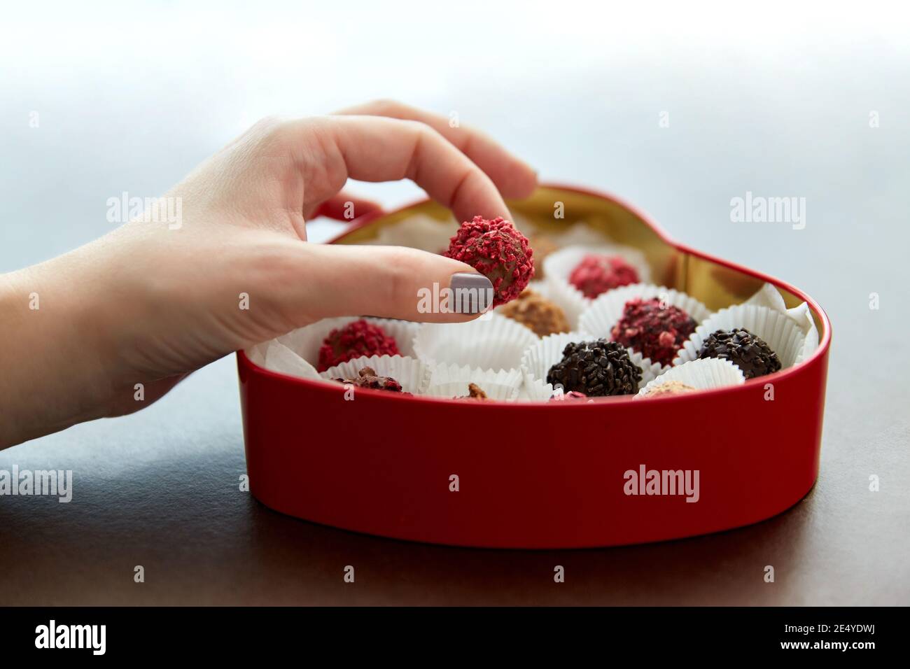 Woman box delicious chocolate hi-res stock photography and images - Alamy