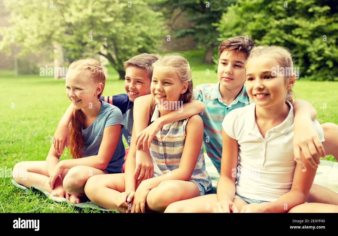 group of happy kids or friends outdoors Stock Photo - Alamy