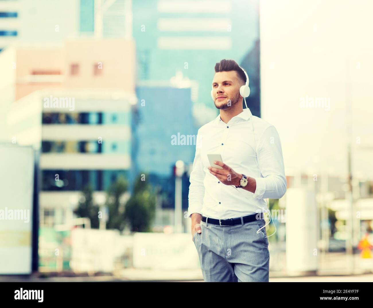 man with headphones and smartphone listening music Stock Photo - Alamy