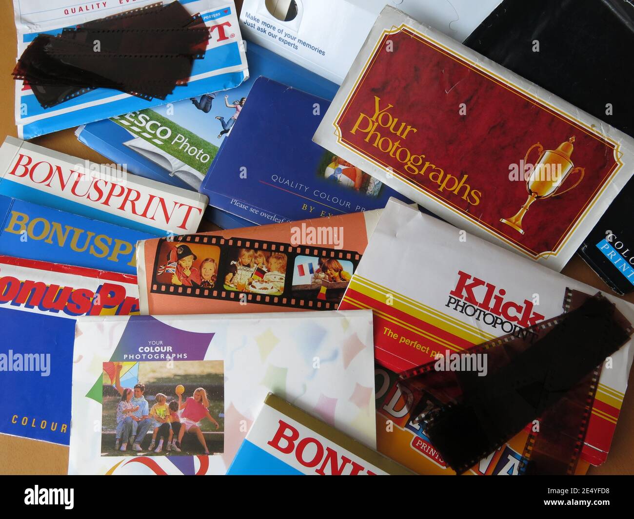 Array of photo wallets eg Bonusprint, Boots, Tesco, Kodak & Klick, who ...