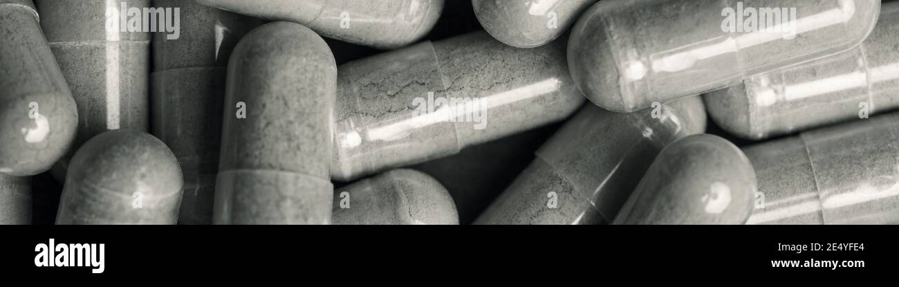 Green and grey capsules hi-res stock photography and images - Alamy