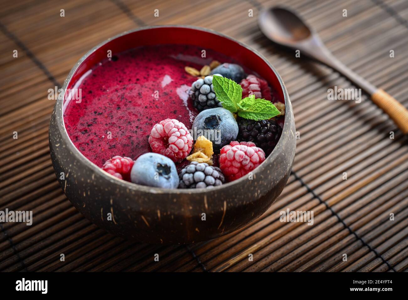 Acai smoothie bowl with blueberry, blackberry, raspberry, granola and ...