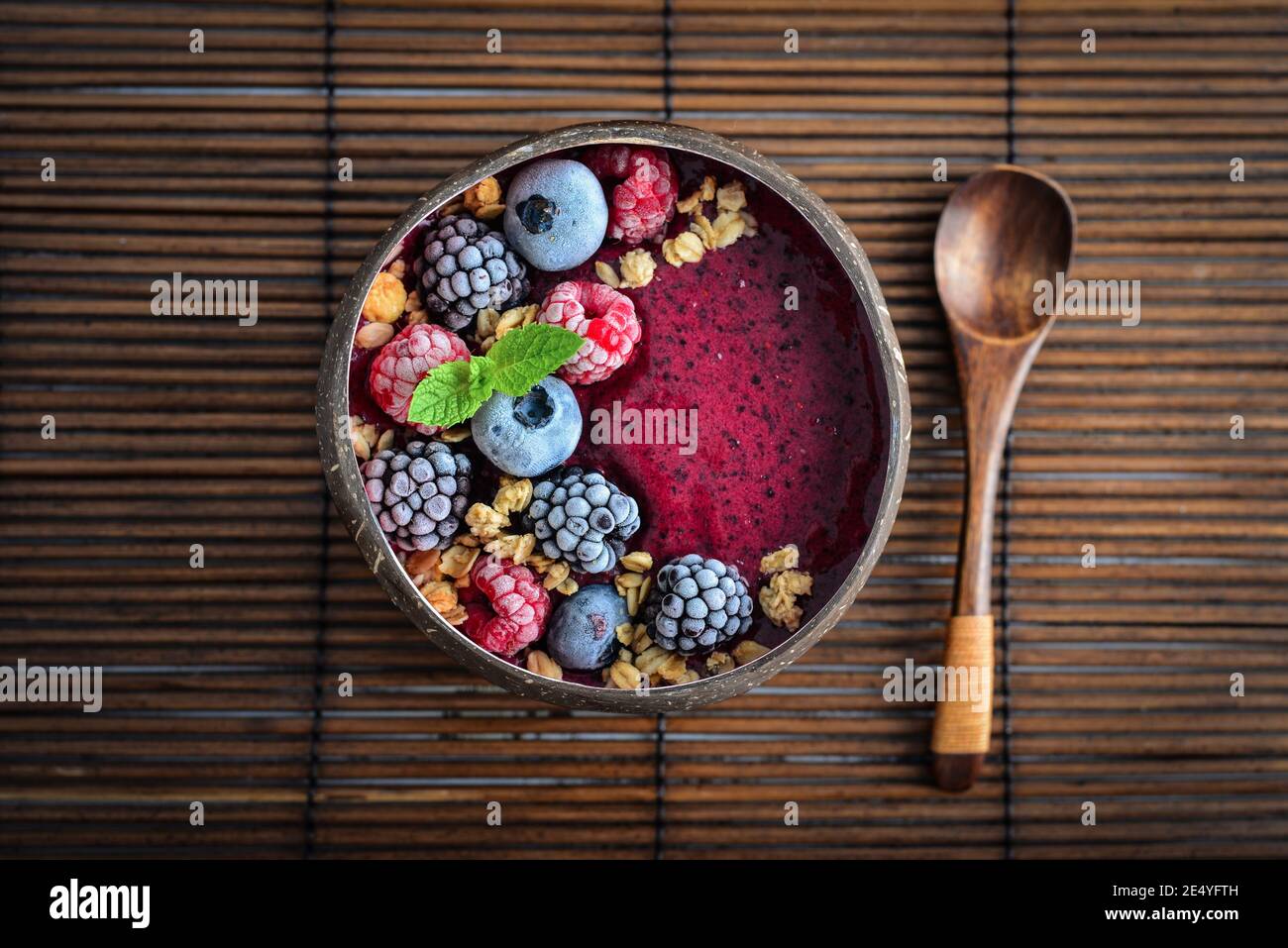 Acai smoothie bowl with blueberry, blackberry, raspberry, granola and ...